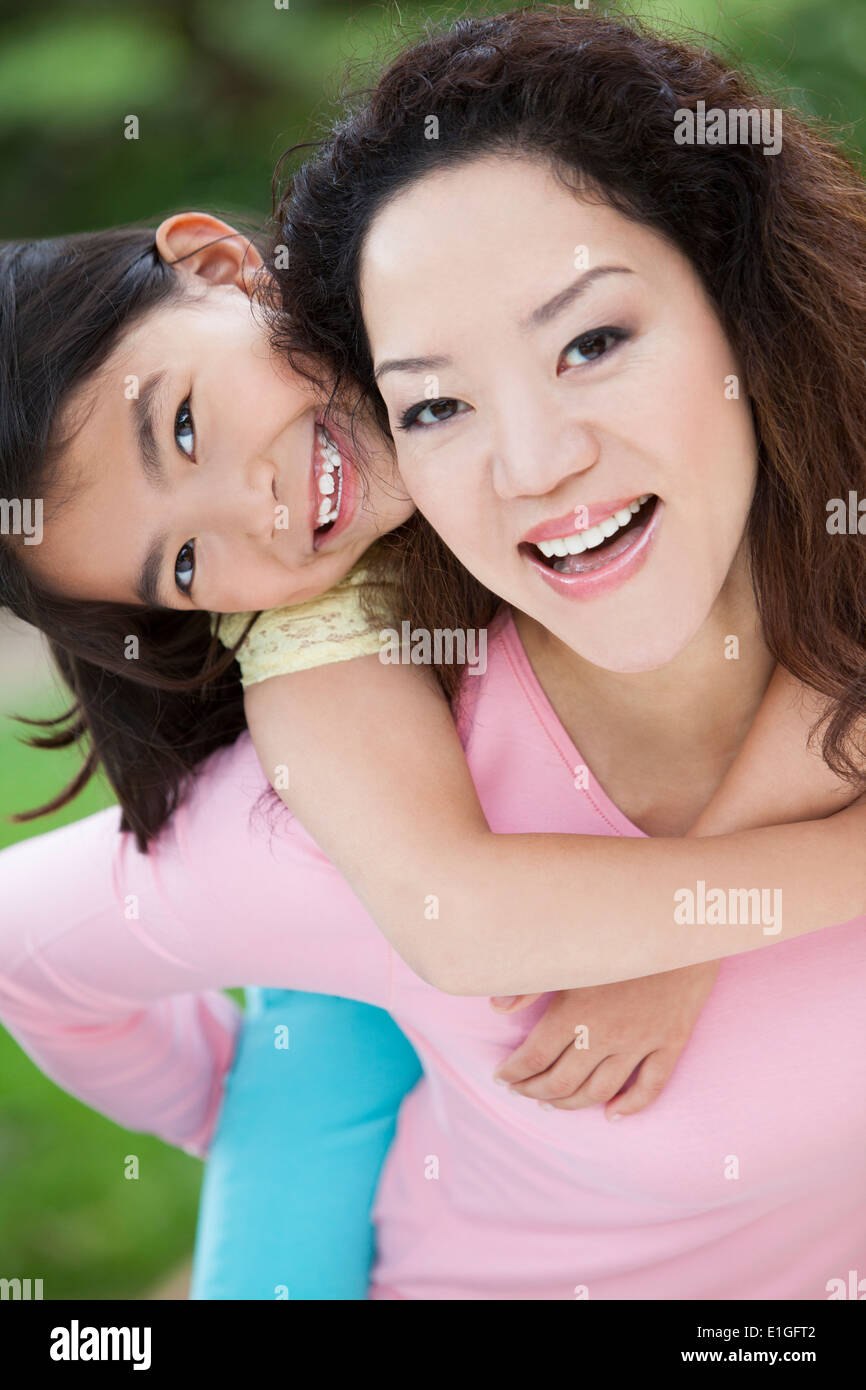 Mother daughter back view mixed race hi-res stock photography and ...