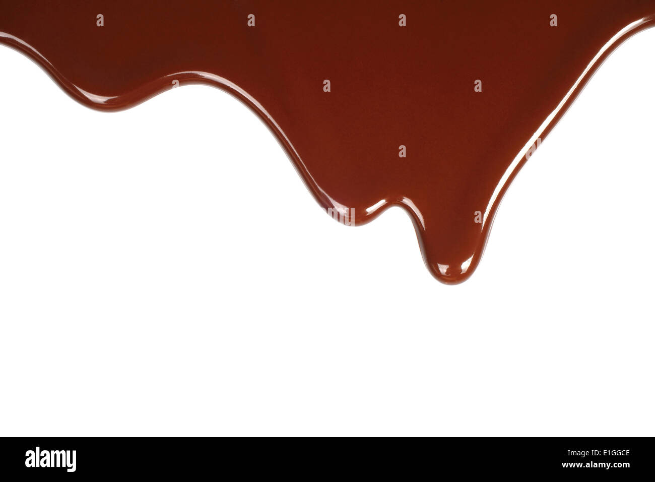 Melted chocolate dripping on white background Stock Photo - Alamy