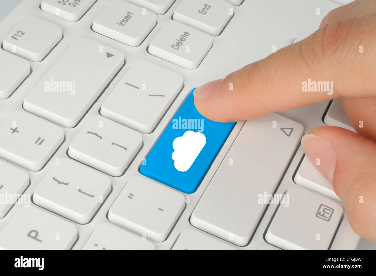 Hand pushing cloud computing button on keyboard Stock Photo - Alamy