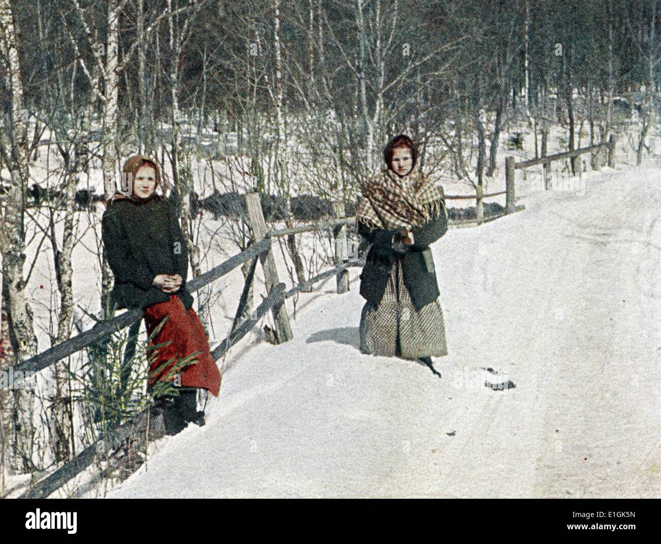 Photomechanical print shows two Russian, orphan girls standing in snow ...