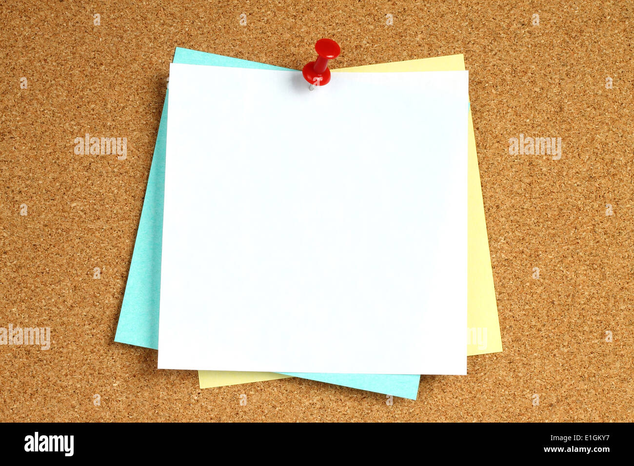 Color notes with pin on wooden background Stock Photo - Alamy