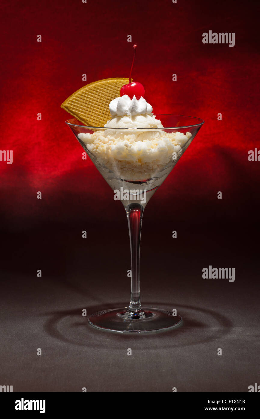 Vanilla ice cream in a Martini glass with with waffle decoration Stock ...