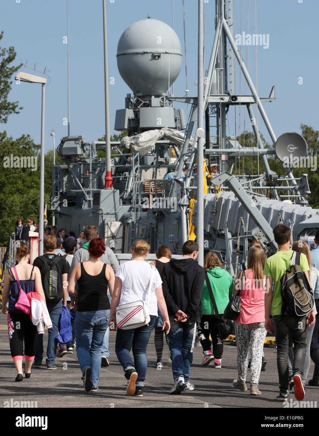 Pupils board a speedboard during the information day of the naval base ...