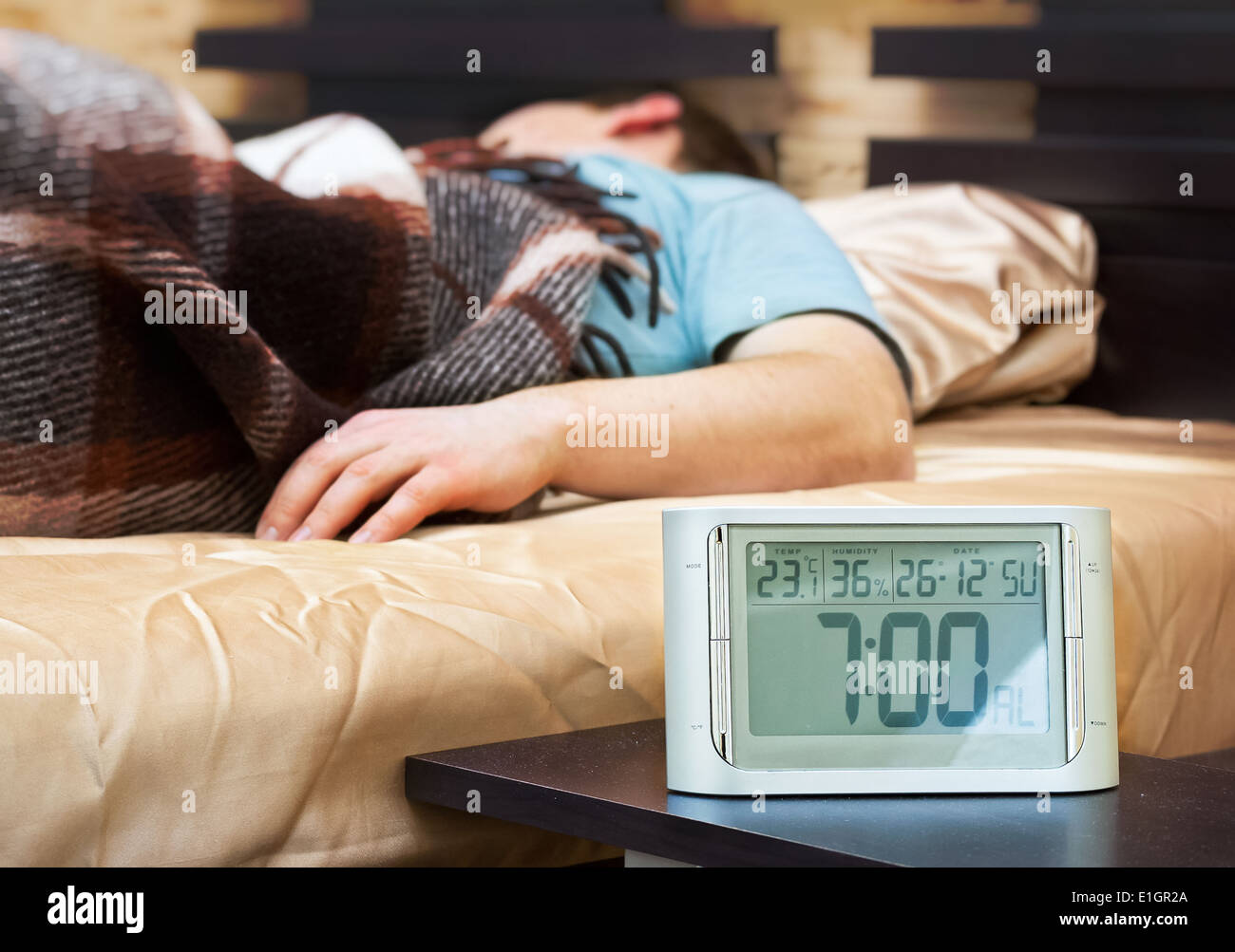 Man with clock hi-res stock photography and images - Alamy