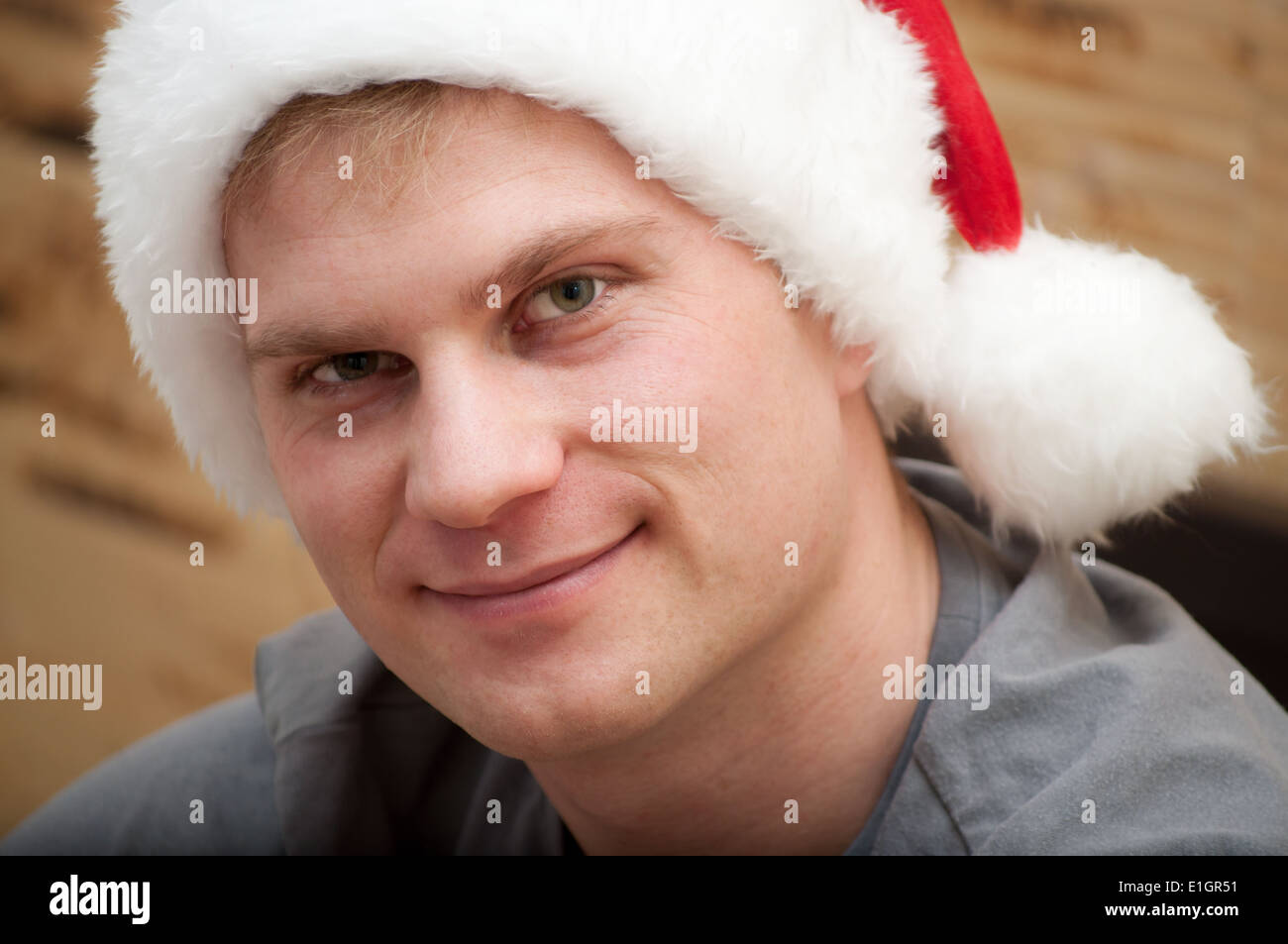 Adult man santa claus sitting hi-res stock photography and images - Alamy