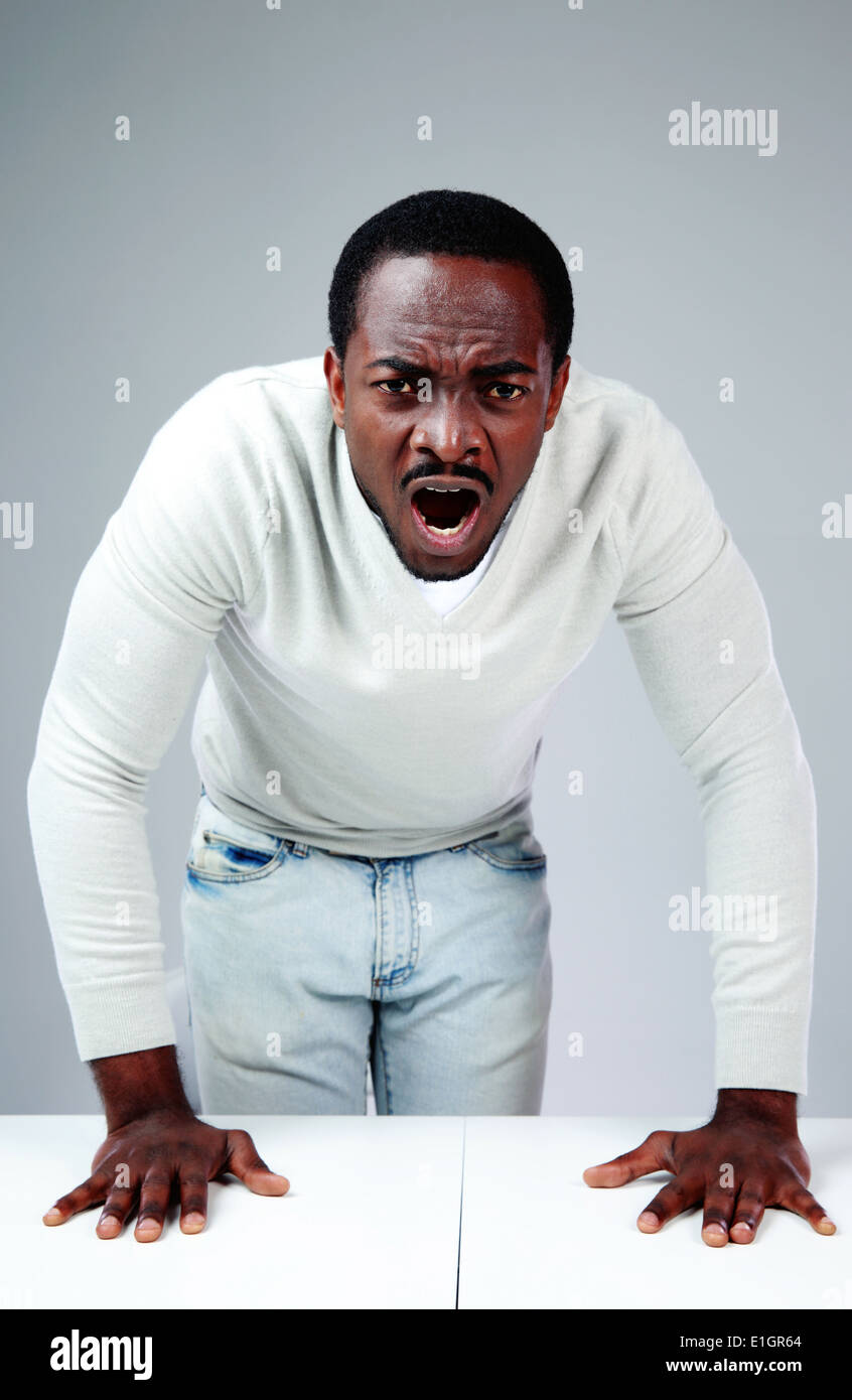 Leaning over to get the shot hi-res stock photography and images - Alamy