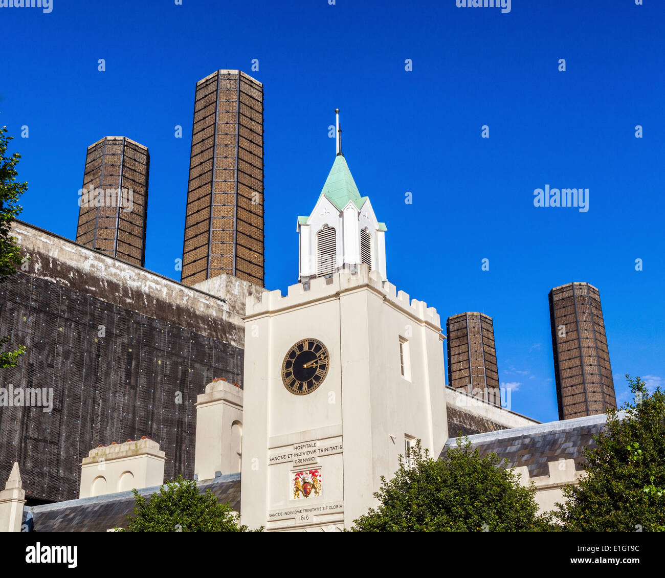 Trinity Hospital clock tower and Greenwich power station chimneys ...
