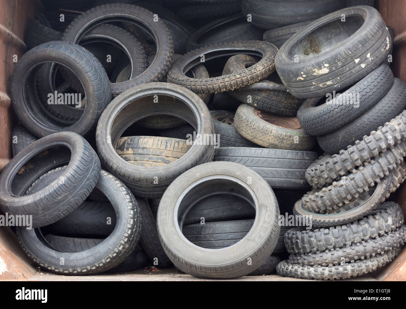 Old recycled tyres hi-res stock photography and images - Alamy