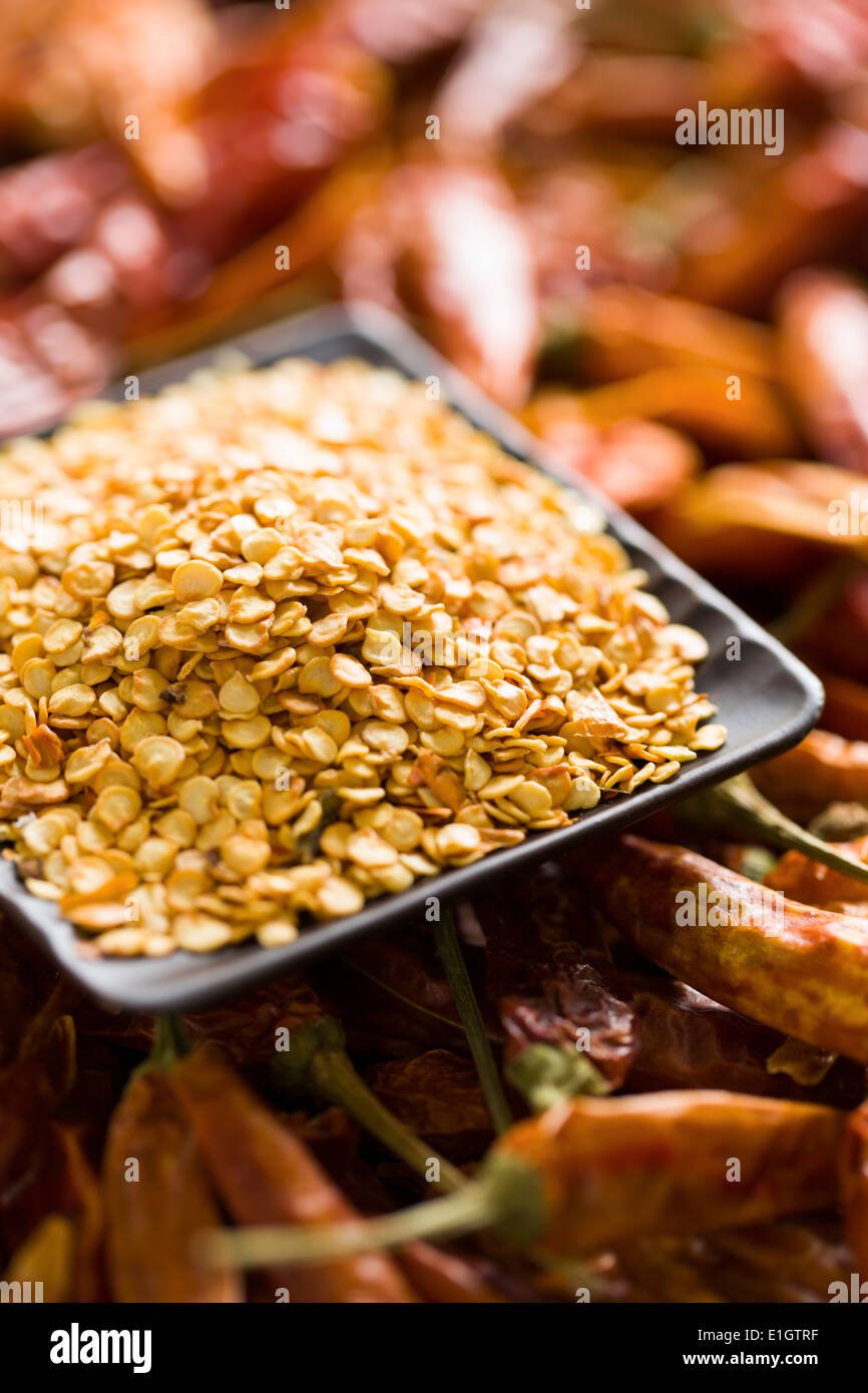 Red chili peppers and seeds Stock Photo - Alamy