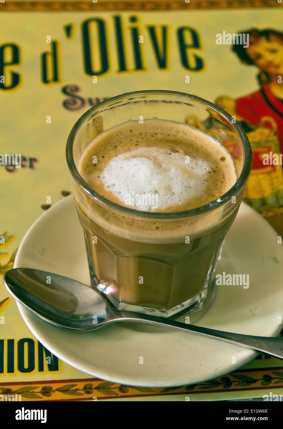 milky coffee in glass Stock Photo - Alamy
