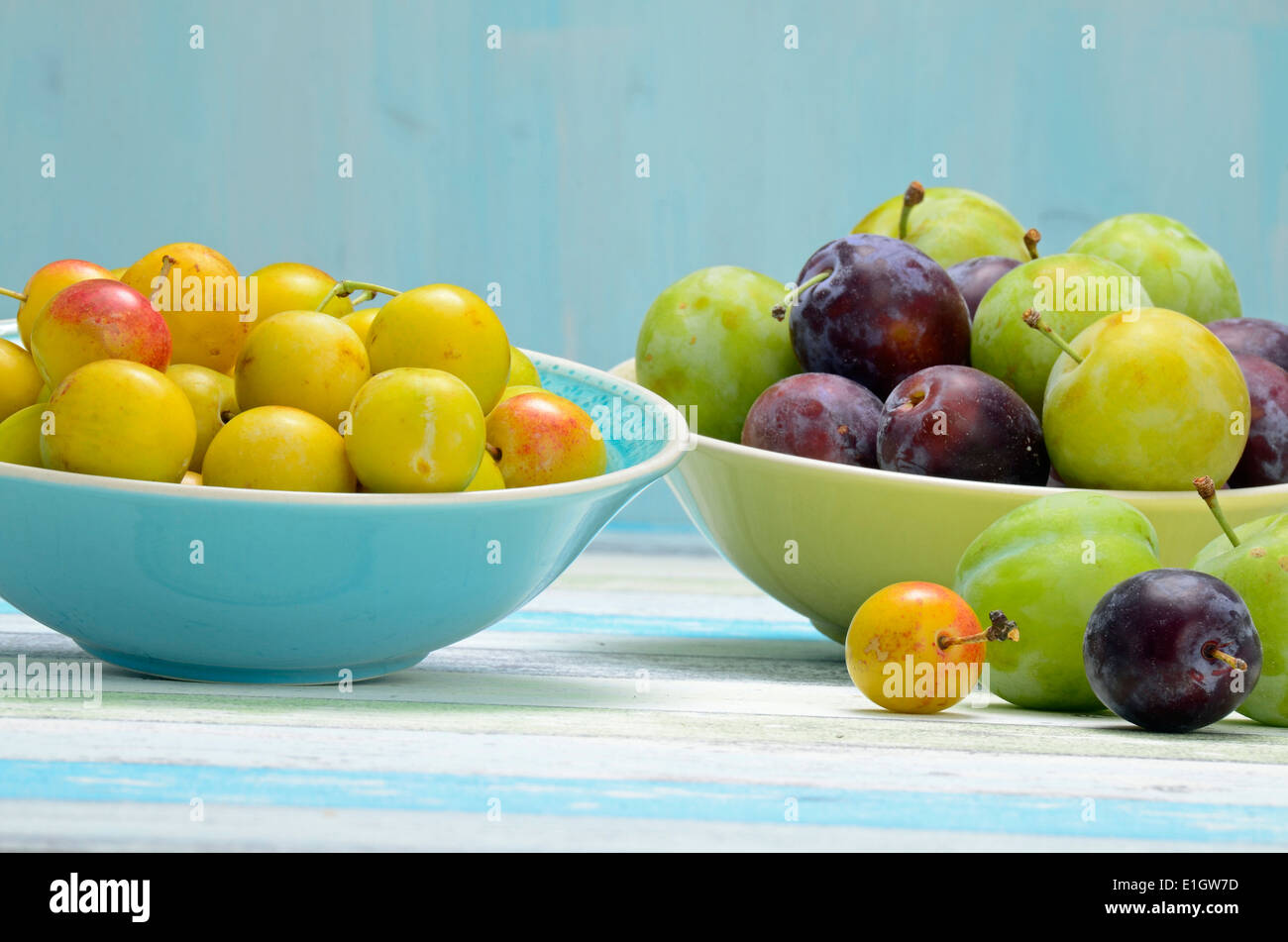 Bowls full of various plums Stock Photo - Alamy