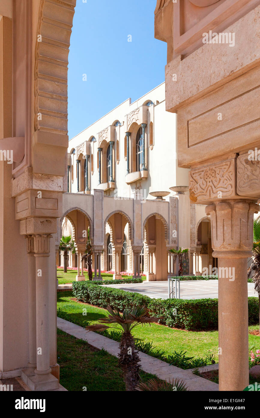 Colonnaded walkway beside the Grand Mosque of Hassan II in Casablanca ...