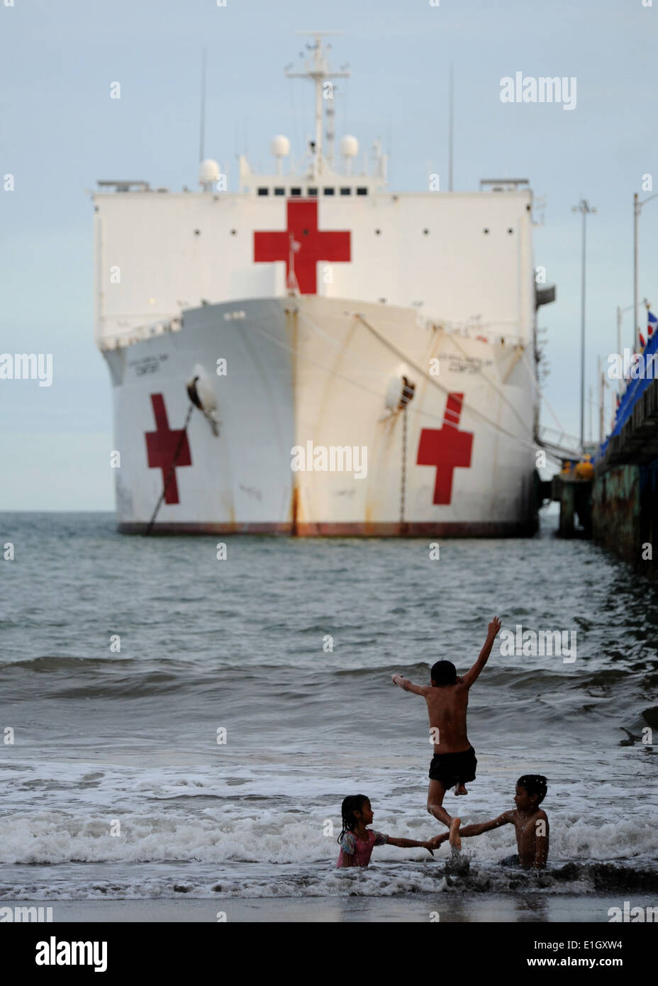 The hospital ship USNS Comfort (T-AH 20) sits at a dock in Puntarenas ...