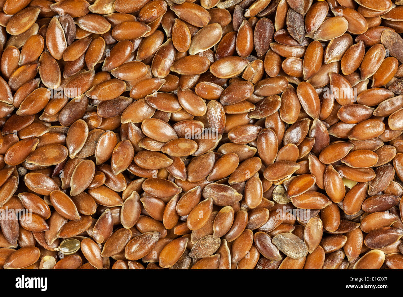 Brown flax seeds background, close up Stock Photo - Alamy
