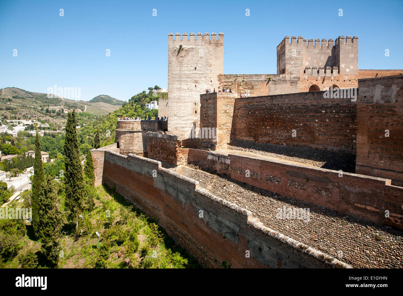 Fortified walls of the Alcazaba castle in the Alhambra complex, Granada ...