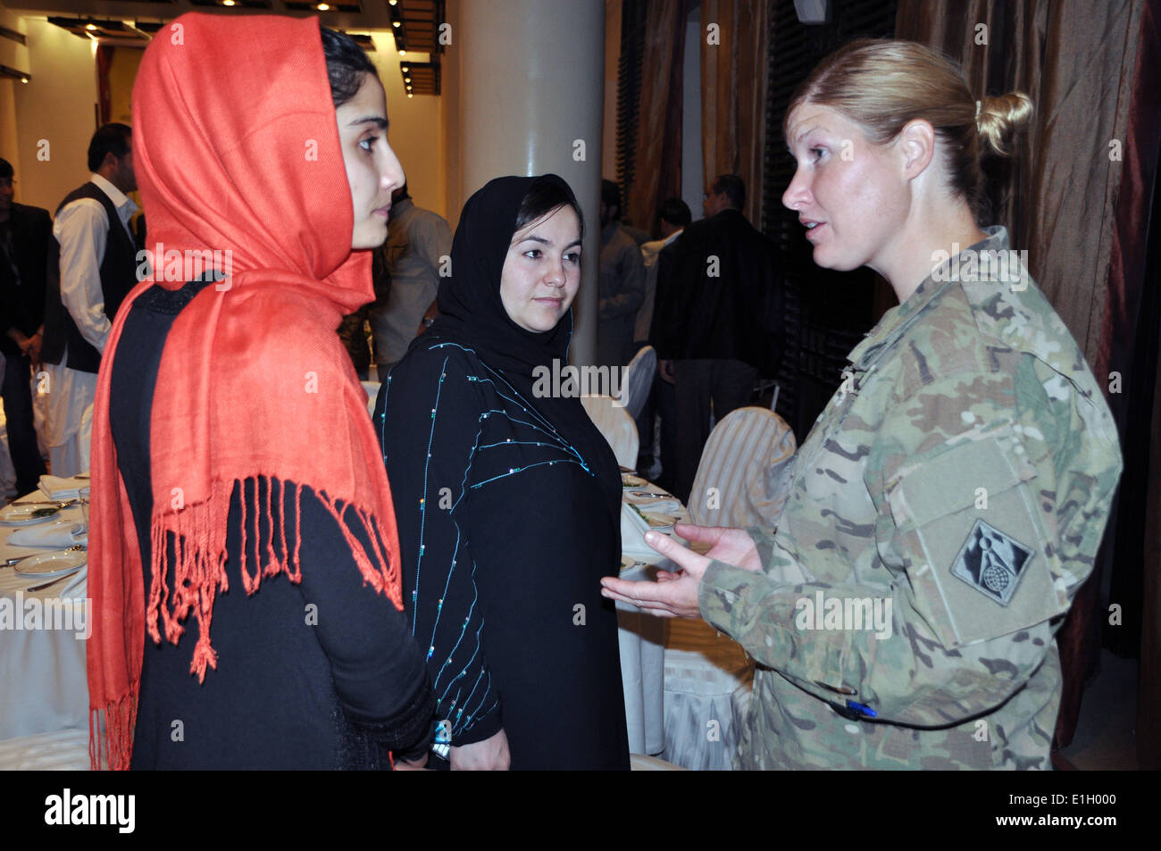 U.S. Army Maj. Erica Iverson, right, the Corps of Engineers Afghanistan ...