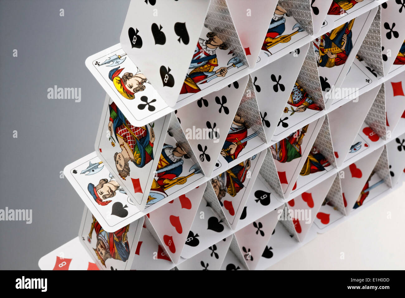 Pyramid of playing cards hi-res stock photography and images - Alamy