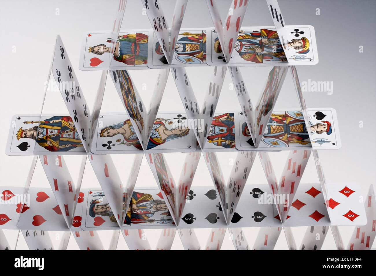 Pyramid of playing cards hi-res stock photography and images - Alamy