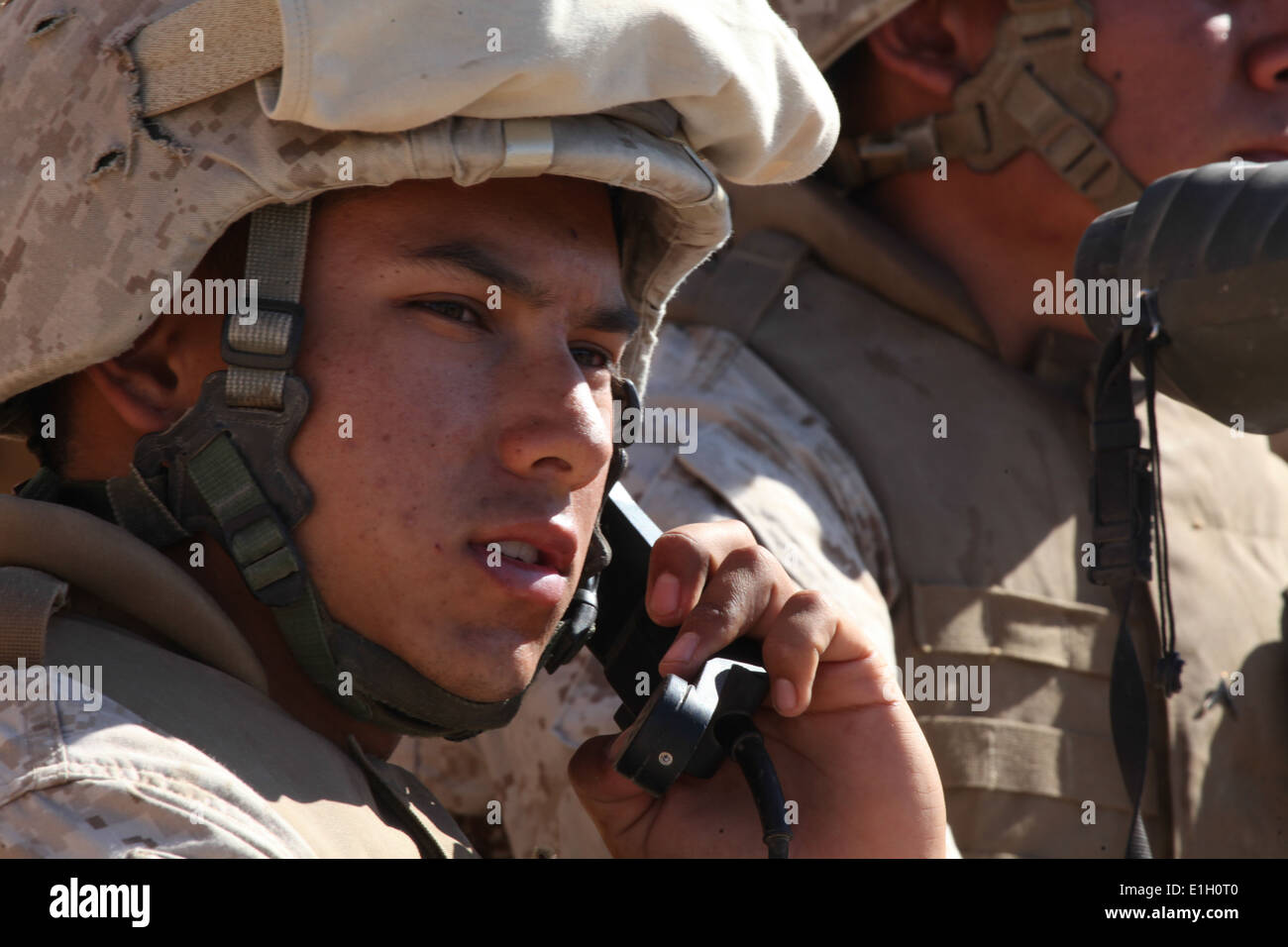 U.S. Marine Forward Observer Pfc. Victor Lopez, with 1st Battalion ...