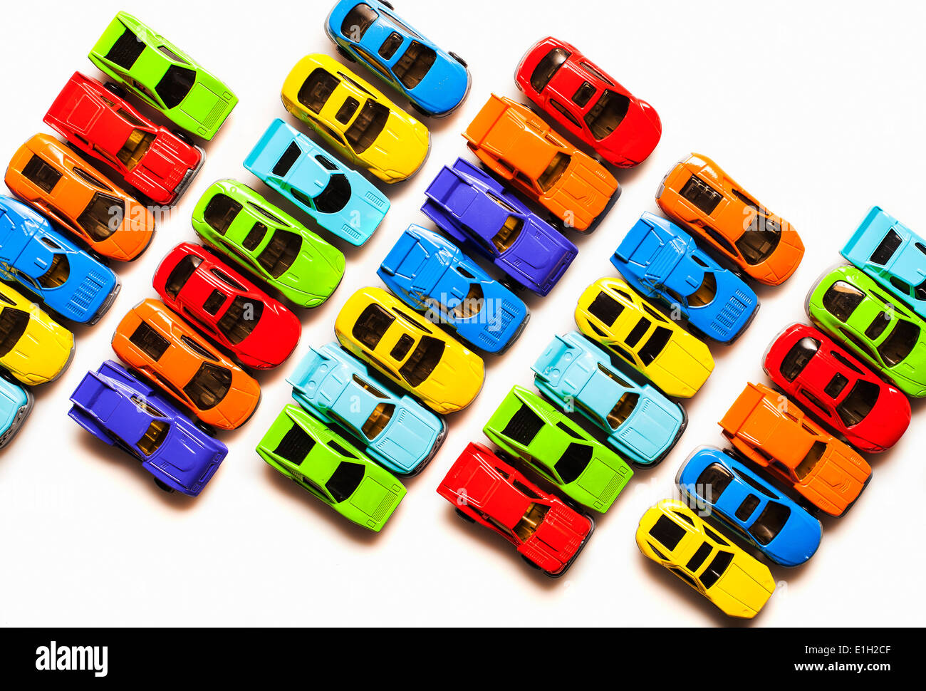 Still life with rows of toy cars Stock Photo - Alamy
