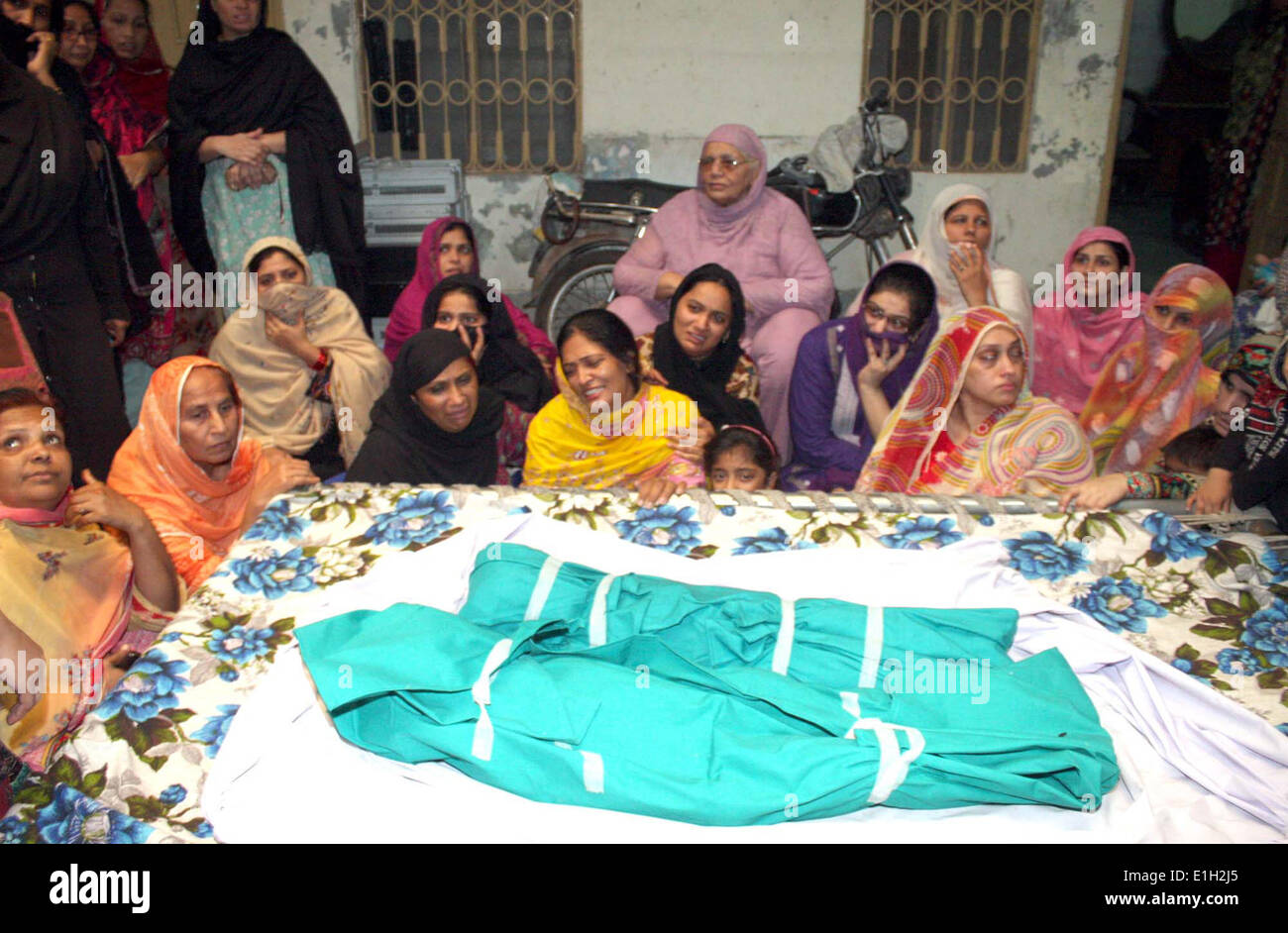 Aliya and khadija who killed by fire erupted hi-res stock photography ...