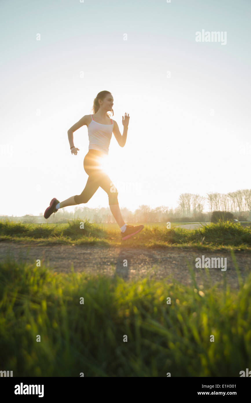 Female runner light hi-res stock photography and images - Alamy