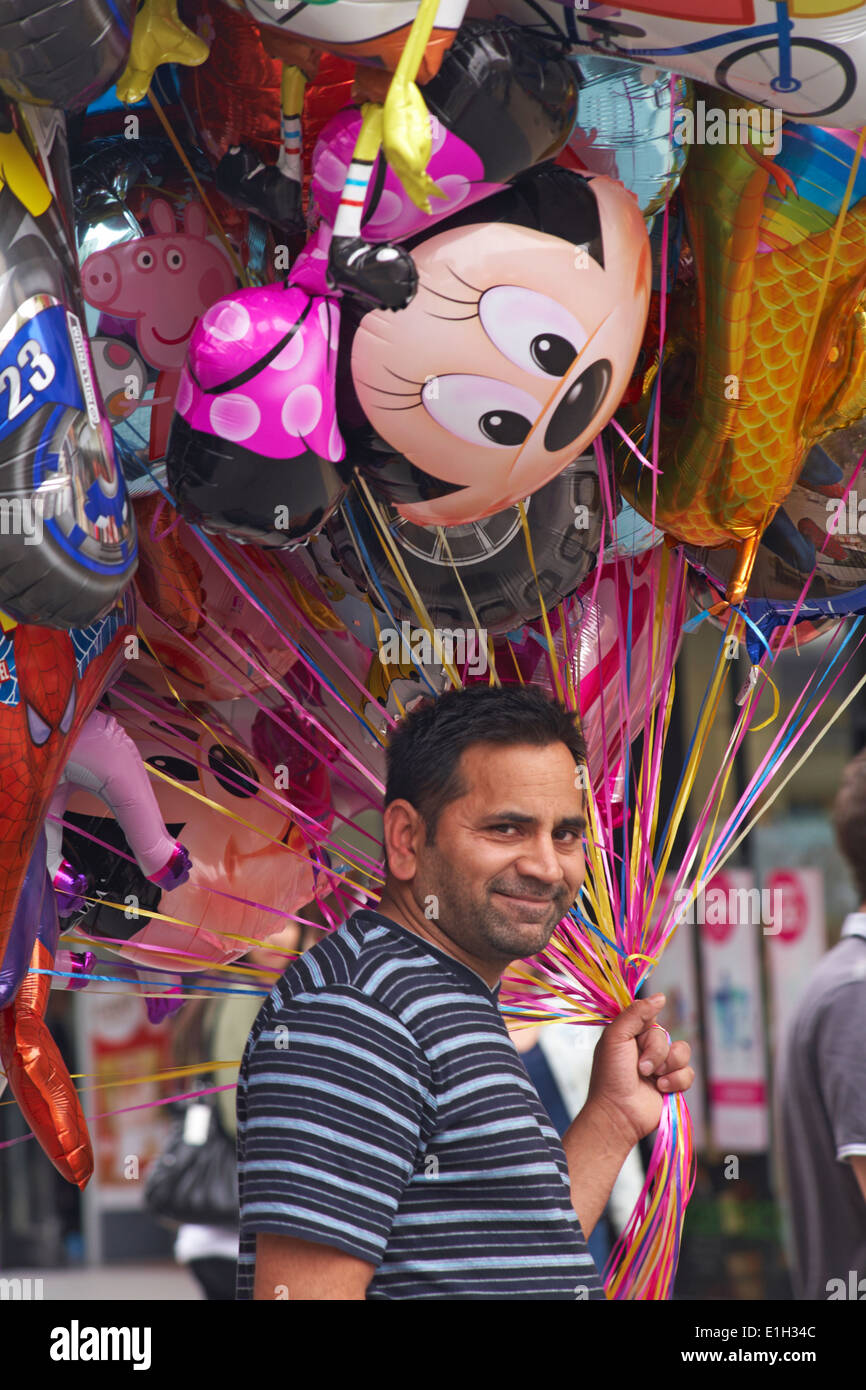 The balloon seller at Bristol Stock Photo - Alamy
