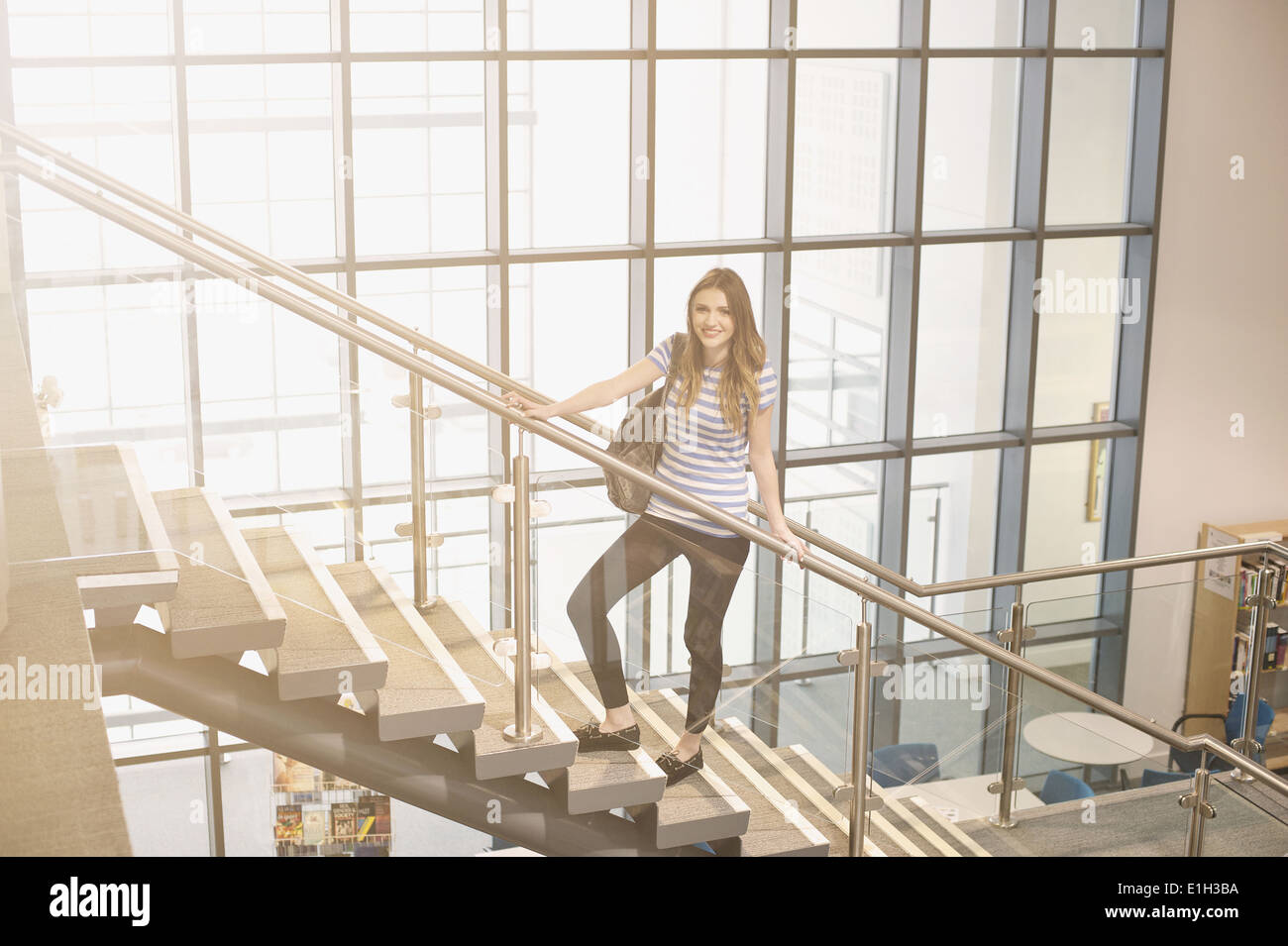 Leaning over rail hi-res stock photography and images - Alamy