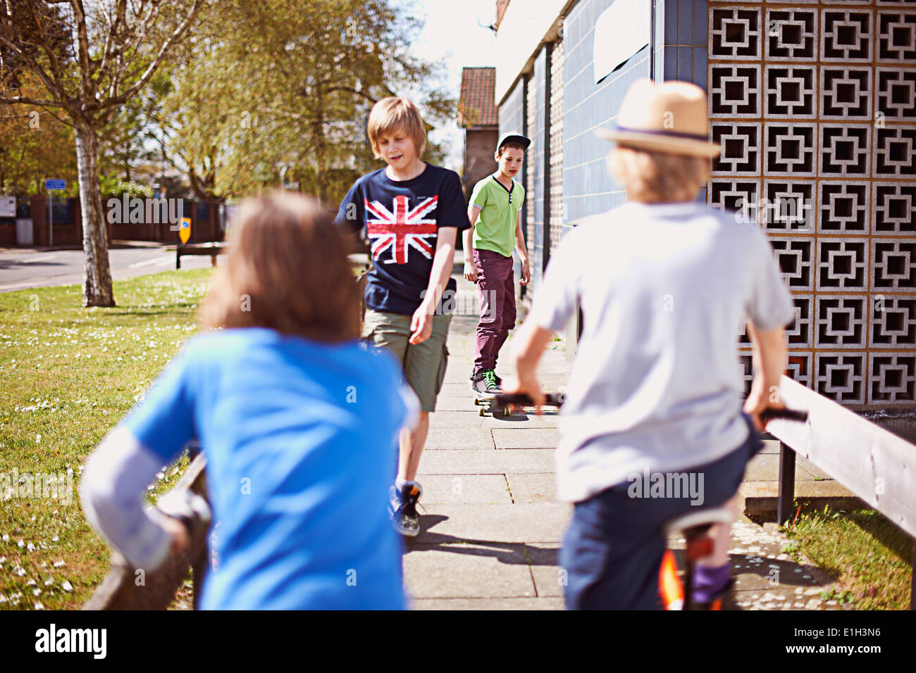 Group of boys on pavement Stock Photo - Alamy