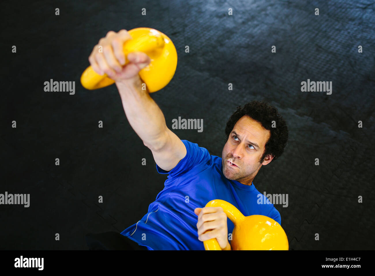 Older person lifting weights hi-res stock photography and images - Alamy