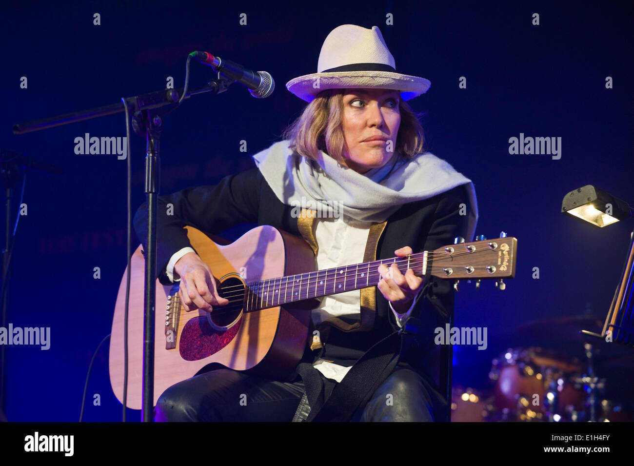 Celebrity music performing guitar on stage playing instrument hi-res ...