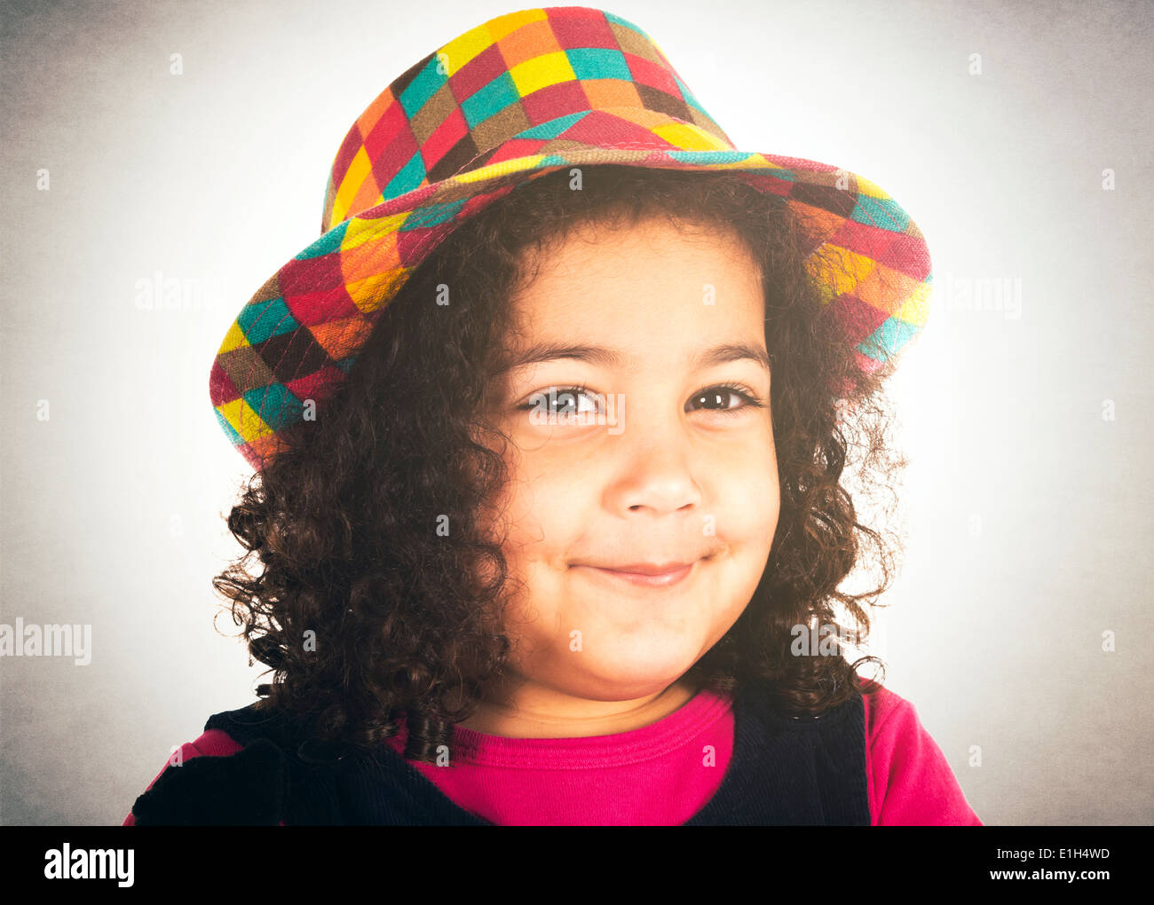 Little child with positive smile on her face Stock Photo - Alamy