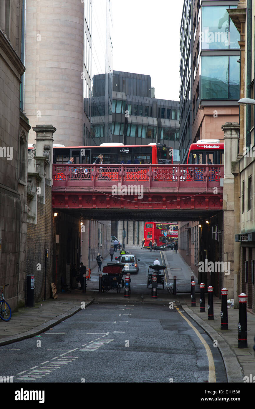 Modern buses pass over the Shoe Lane road bridge, Holborn Viaduct ...