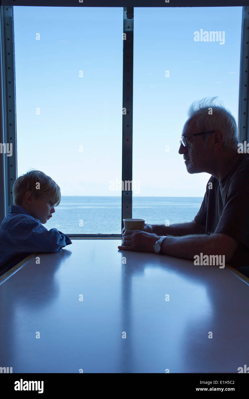 Two people sitting opposite hi-res stock photography and images - Alamy