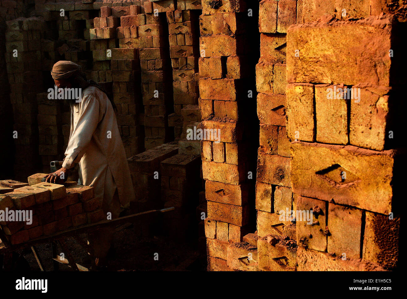 Peshawar, Pakistan, 2008. A brick factory where workers are mostly ...