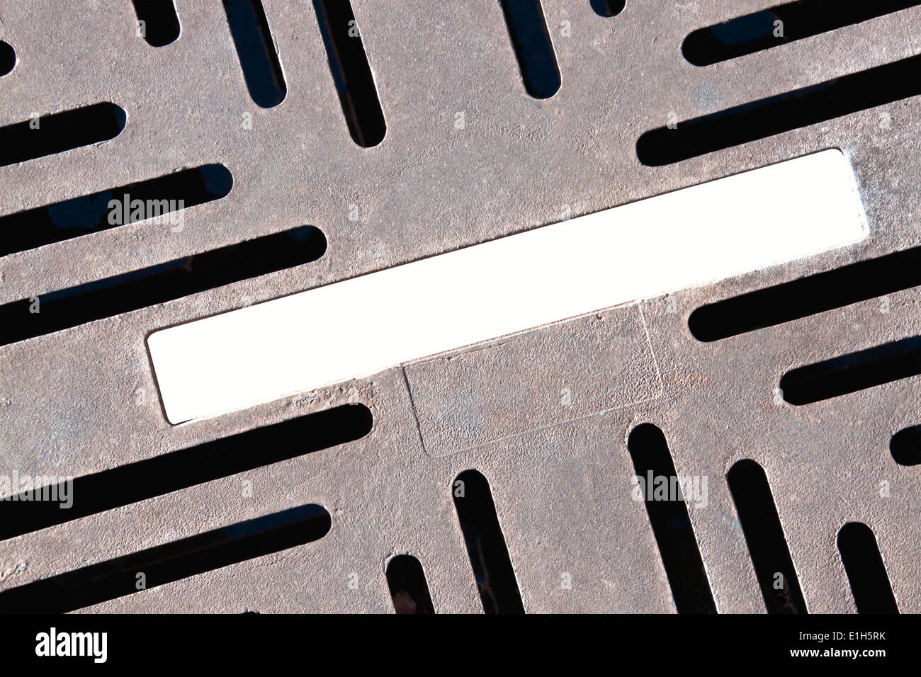 Background closeup of grid pattern on metal cover plate with copy space ...