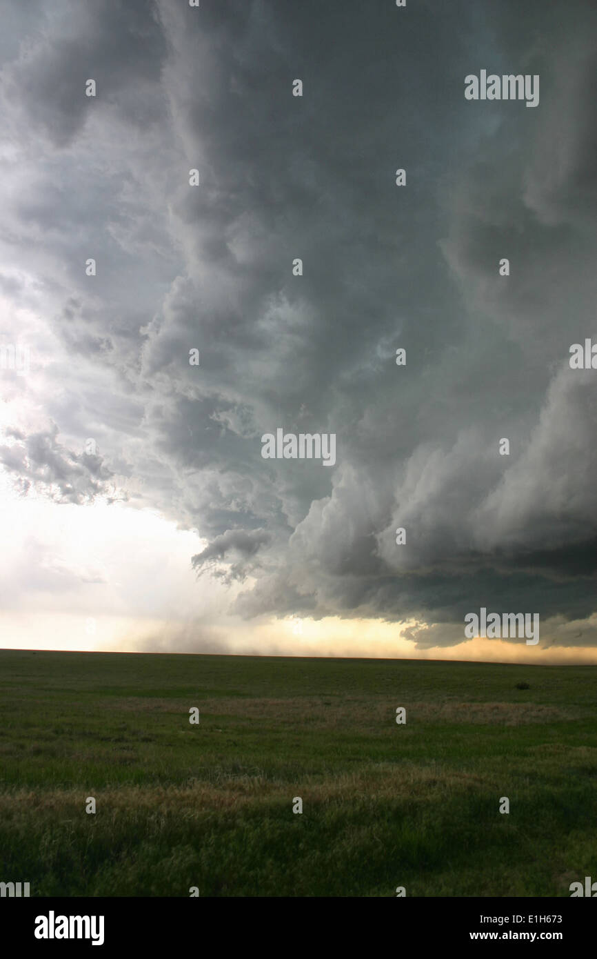 Outflow winds form a dramatic shelf cloud from a supercell thunderstorm ...