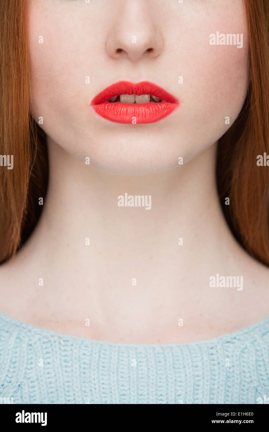 Cropped image of young woman's lips Stock Photo - Alamy