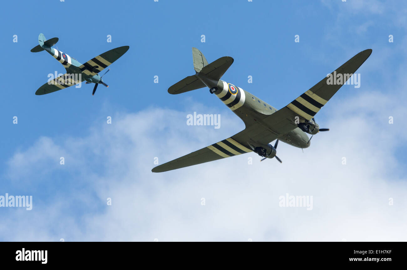 A Spitfire and DC3 Dakota in D-Day markings at the Duxford Airshow ...