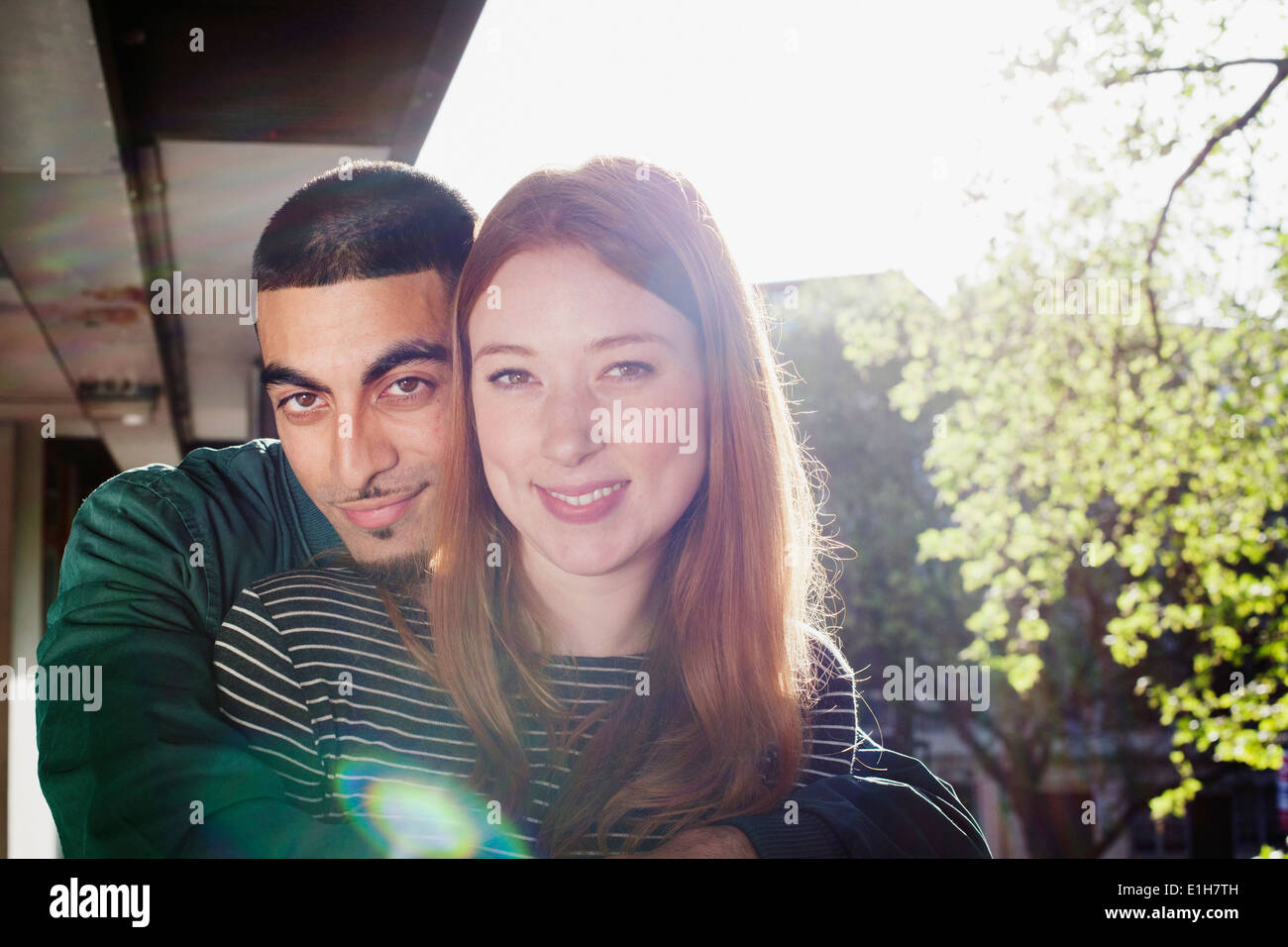 Man arm around woman group hi-res stock photography and images - Alamy