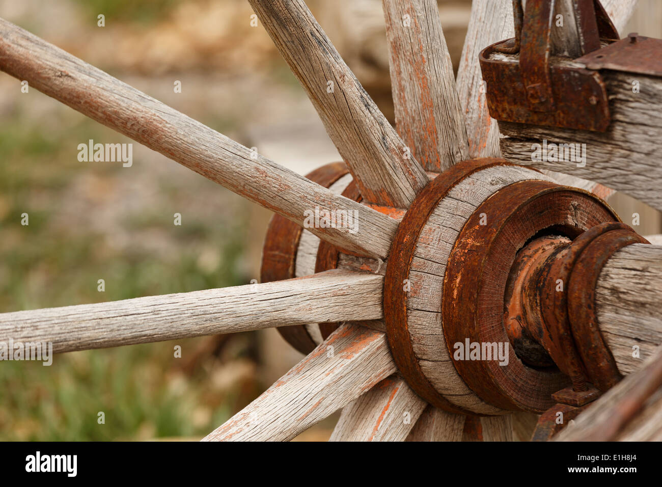 old wagon wheel with rust Stock Photo - Alamy