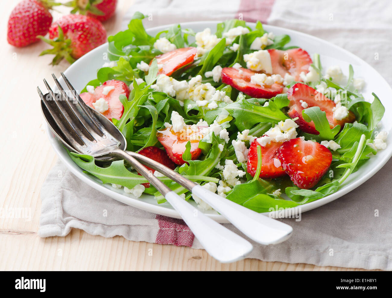 Strawberry with Rocket salad Stock Photo - Alamy