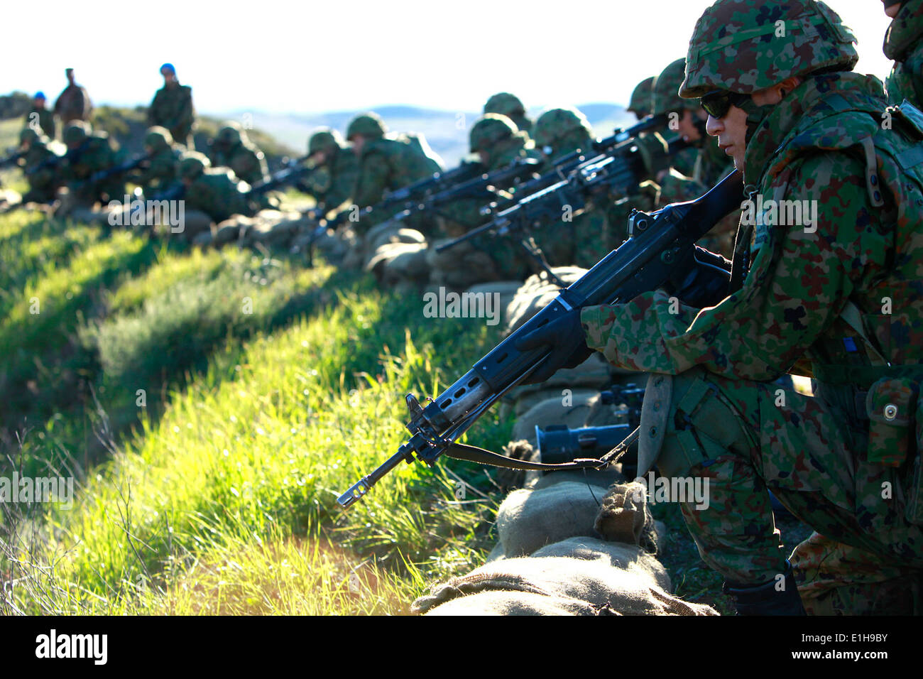 Japan Ground Self Defense Force (JGSDF) soldiers sight in on targets ...