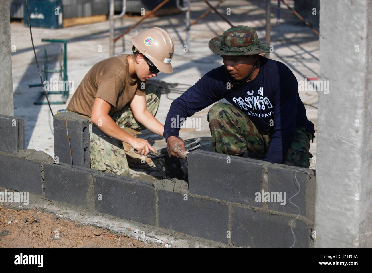 U.S. Navy Builder Constructionman Melissa Talley, left, with Naval ...
