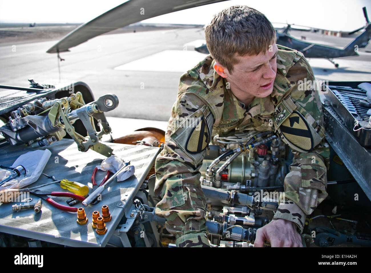 U.S. Army Sgt. Corey Christensen, a UH-60 Black Hawk helicopter crew ...