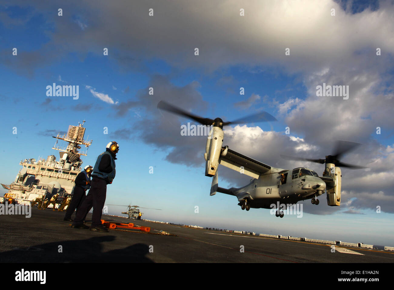 A U.S. Marine Corps MV-22 Osprey aircraft assigned to Marine Medium Tiltrotor Squadron (VMM) 261 ...