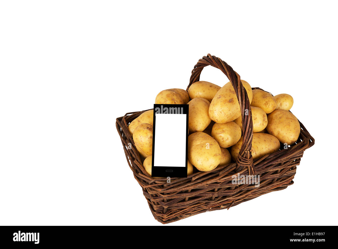 Market-basket with raw potatoes and a self designed smartphone with ...