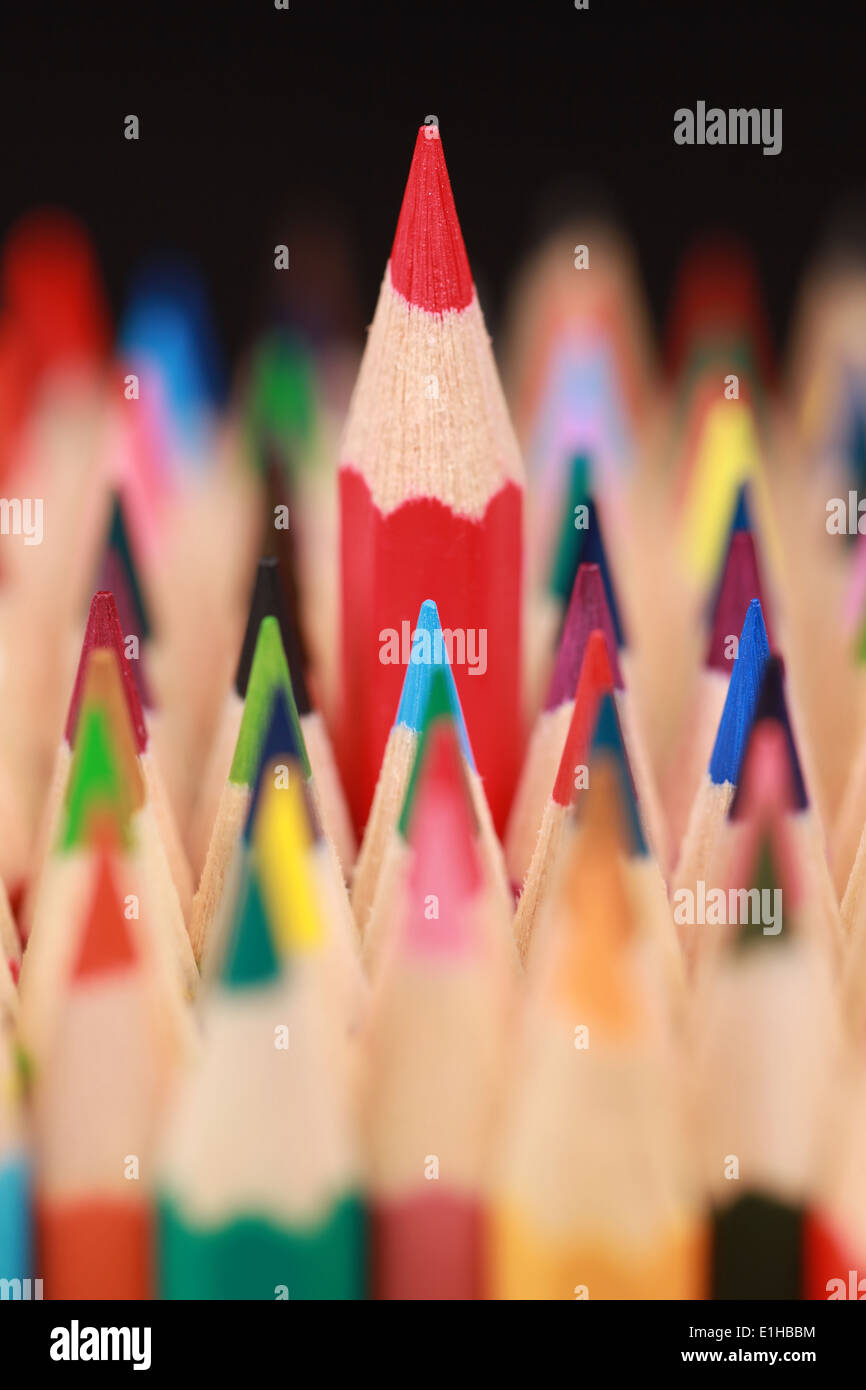 One red crayon standing out from the crowd Stock Photo - Alamy