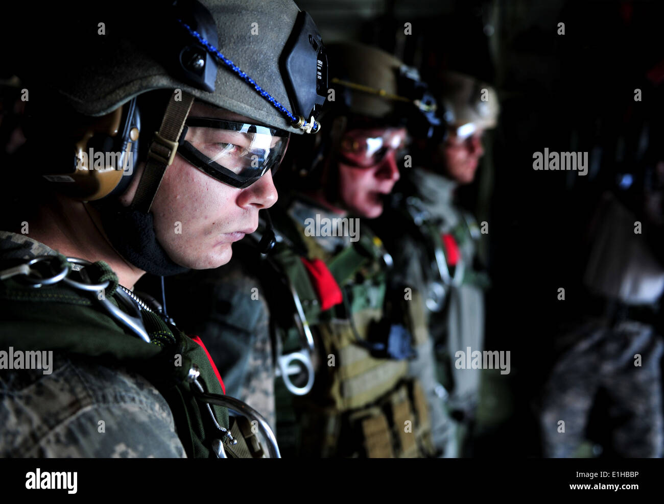 U.S. Army Special Forces Soldiers prepare for a high altitude low opening jump from a Royal Air ...