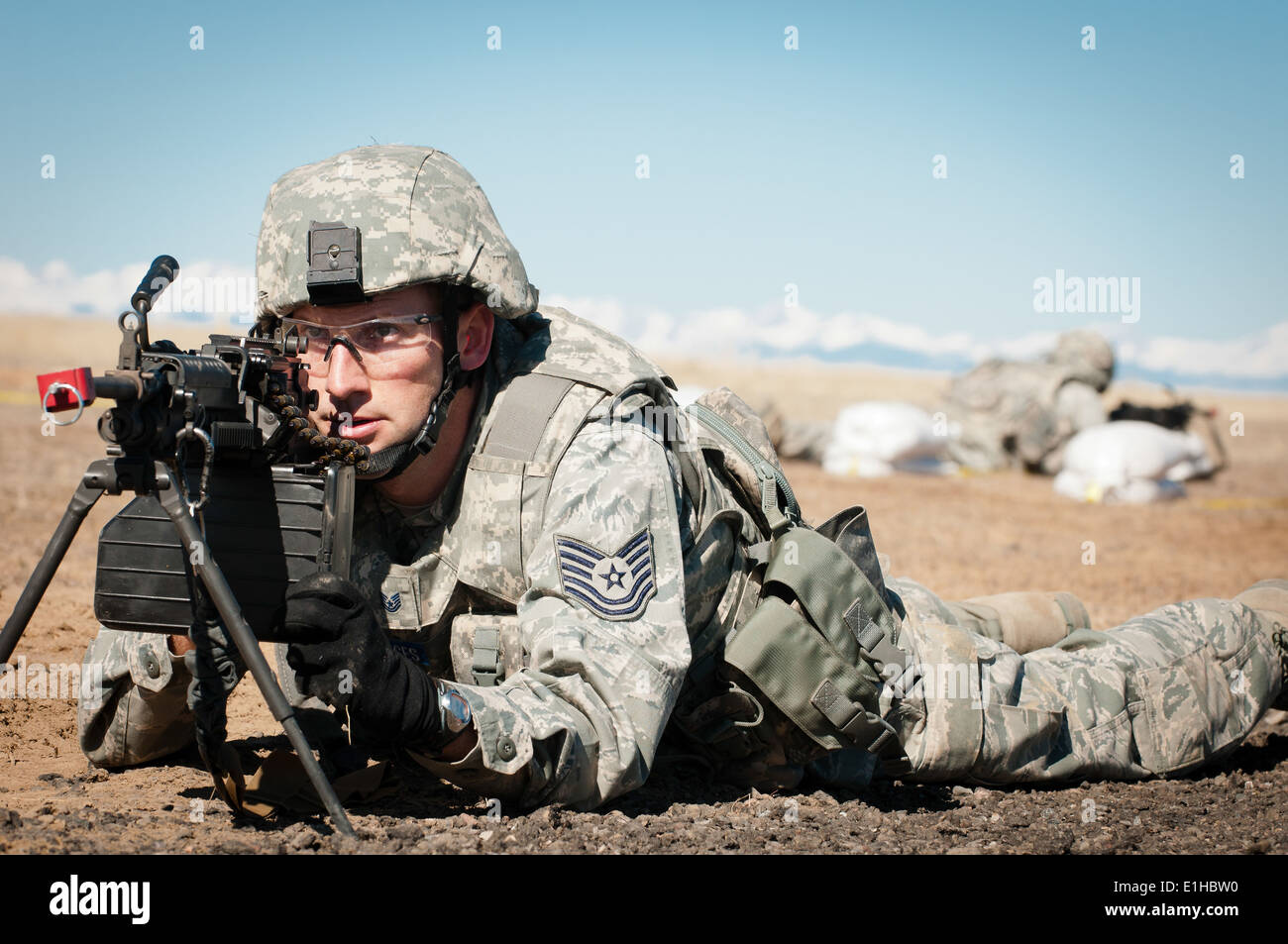 U.S. Air Force Tech. Sgt. Derek Castellano, foreground, assigned to the ...